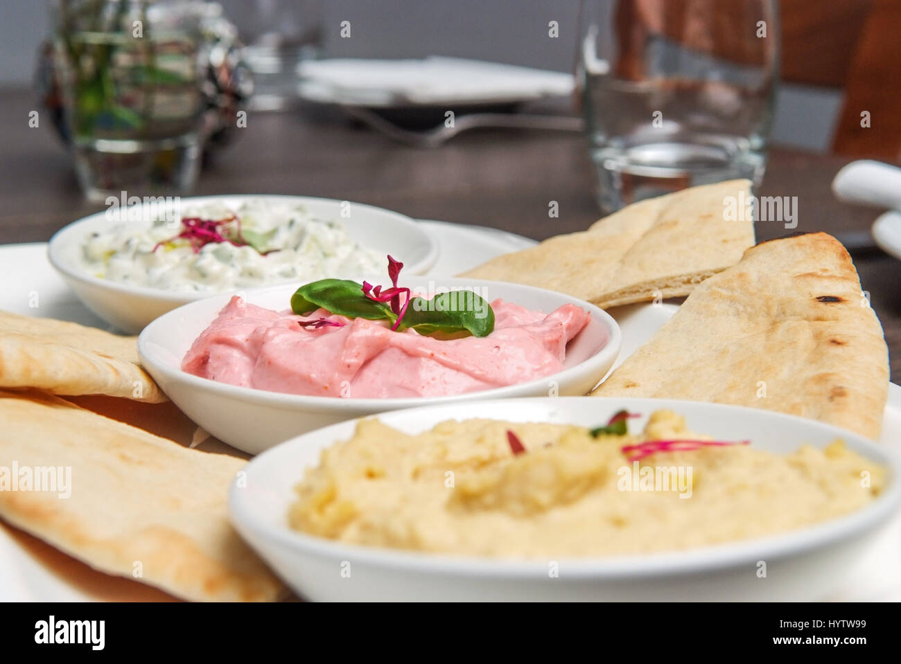 restaurant starter meal of a sharing platter of dips with bread Stock ...