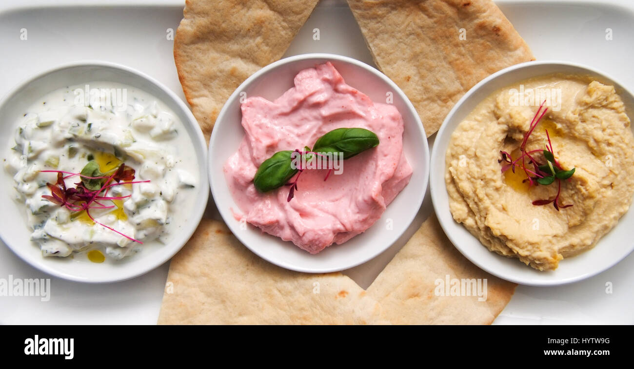 restaurant starter meal of a sharing platter of dips with bread Stock ...