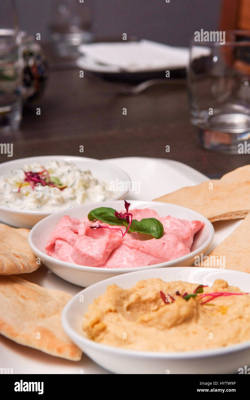 restaurant starter meal of a sharing platter of dips with bread Stock ...