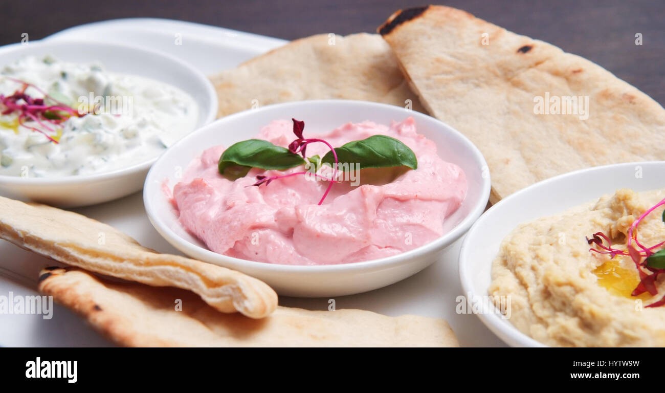 restaurant starter meal of a sharing platter of dips with bread Stock ...