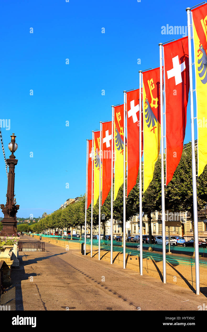 Swiss flags and Geneva canton flags on Lake Geneva promenade ...
