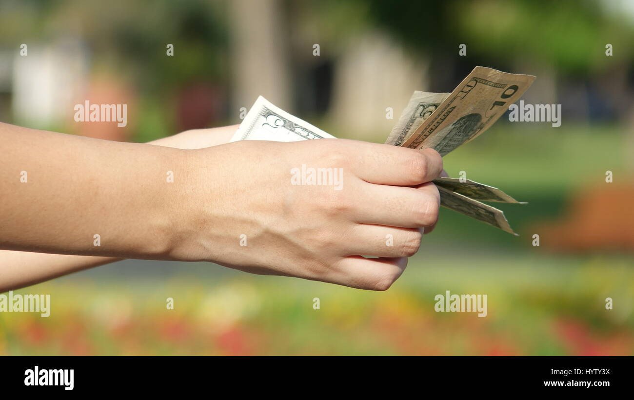 Lady counting money hi-res stock photography and images - Alamy