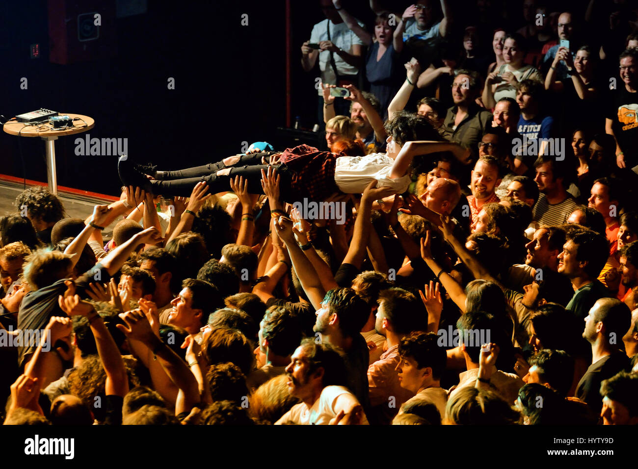 BARCELONA - JUN 5: A fan does crowd surfing with the crowd in a concert ...