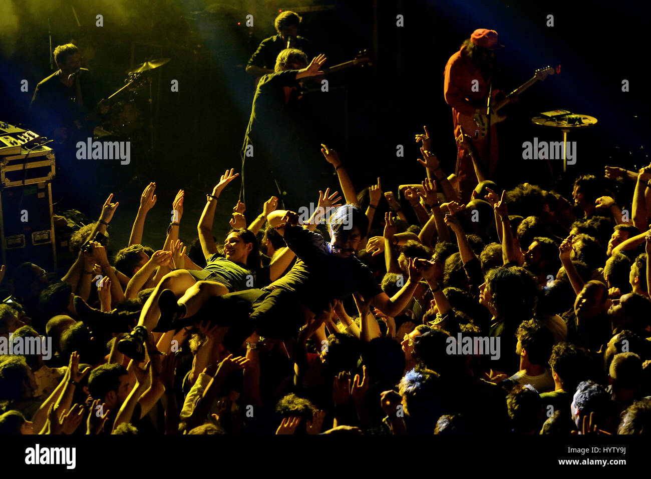 BARCELONA - JUN 5: A fan does crowd surfing with the crowd in a concert ...