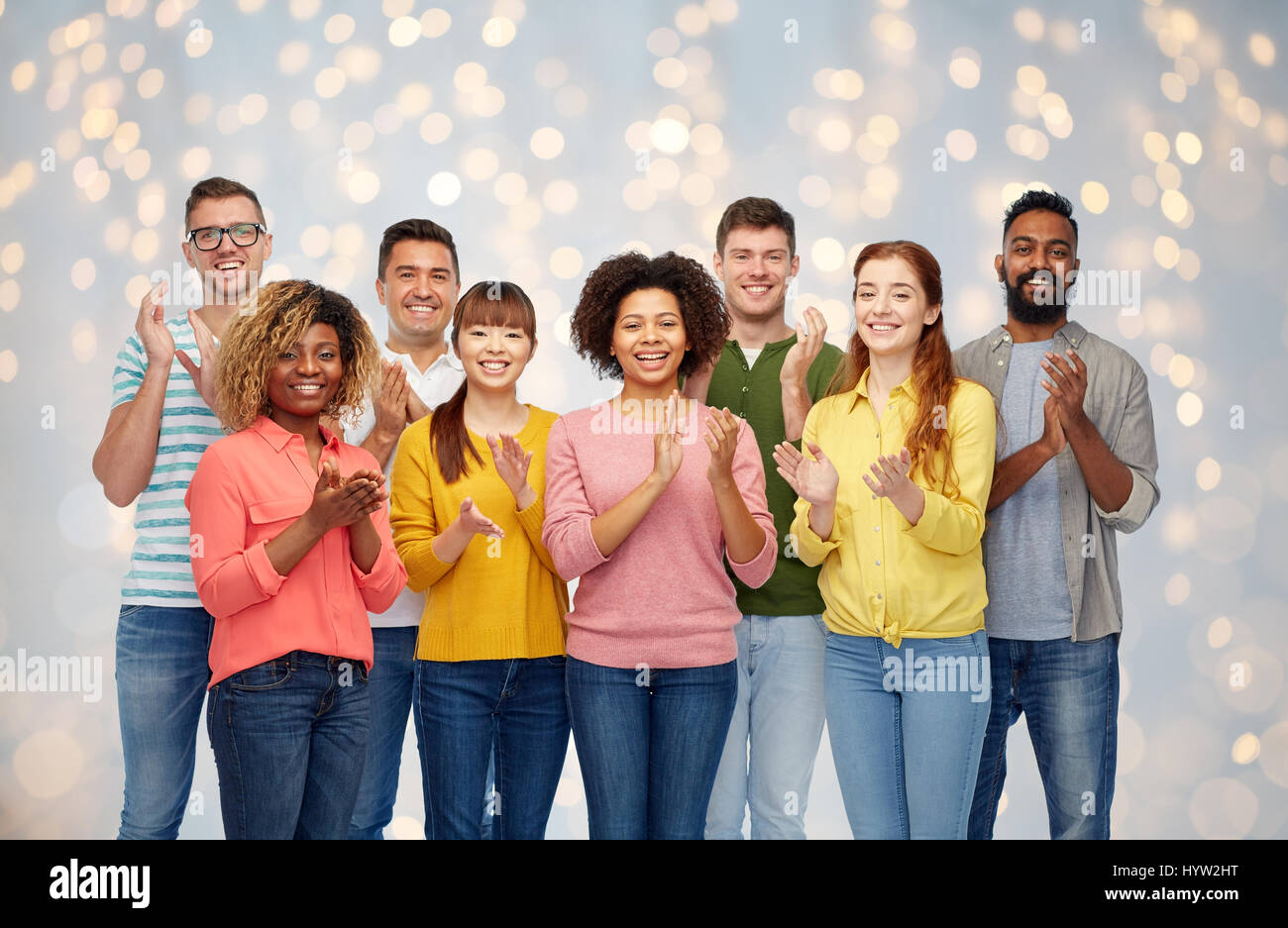 international group of happy people applauding Stock Photo - Alamy
