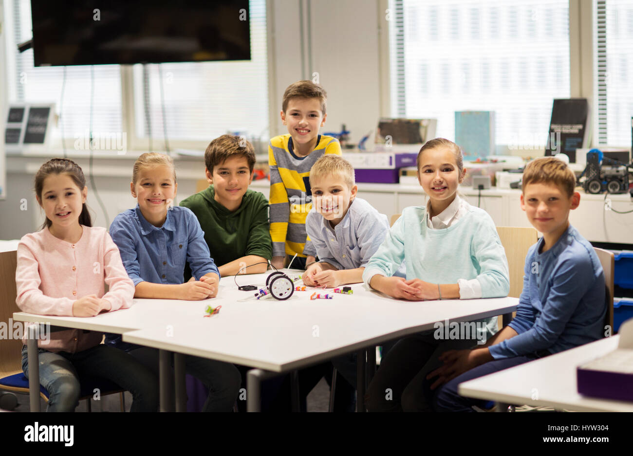 happy children building robots at robotics school Stock Photo - Alamy