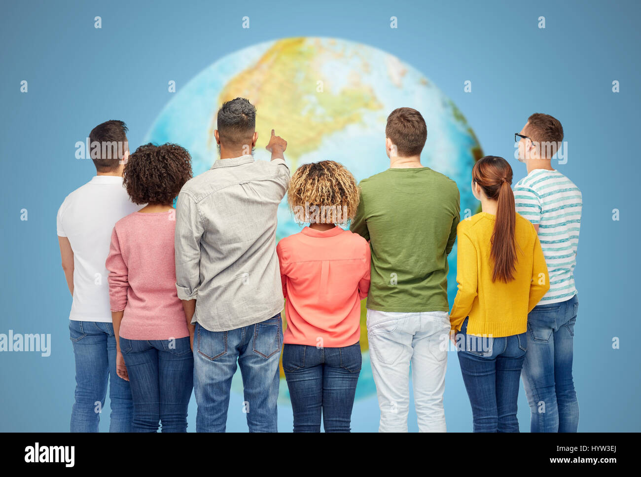 group of people pointing to something Stock Photo - Alamy