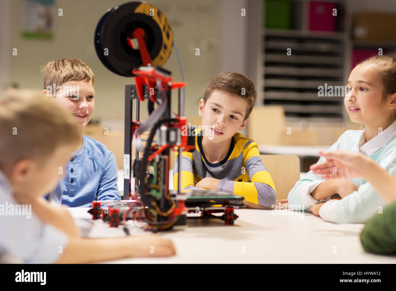 happy children with 3d printer at robotics school Stock Photo - Alamy