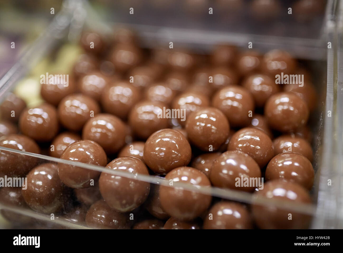 close up of chocolate dragee candies in box Stock Photo - Alamy