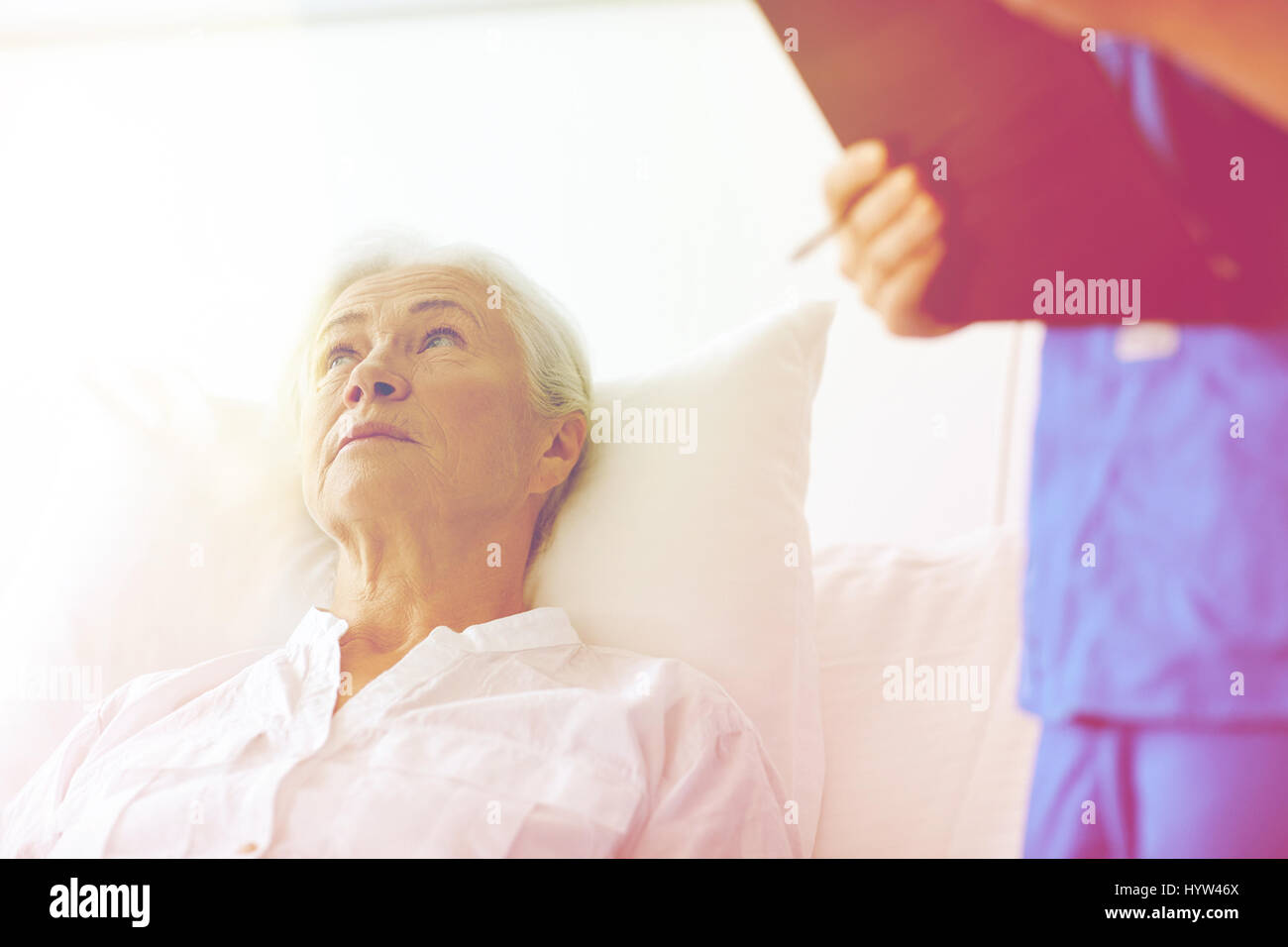 nurse and senior woman patient at hospital Stock Photo - Alamy