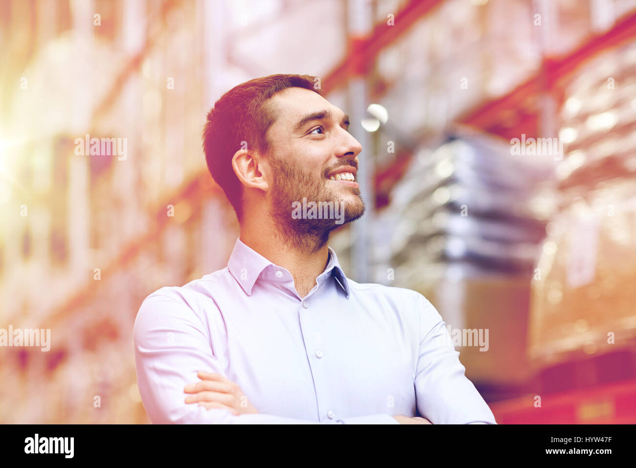 happy man at warehouse Stock Photo - Alamy