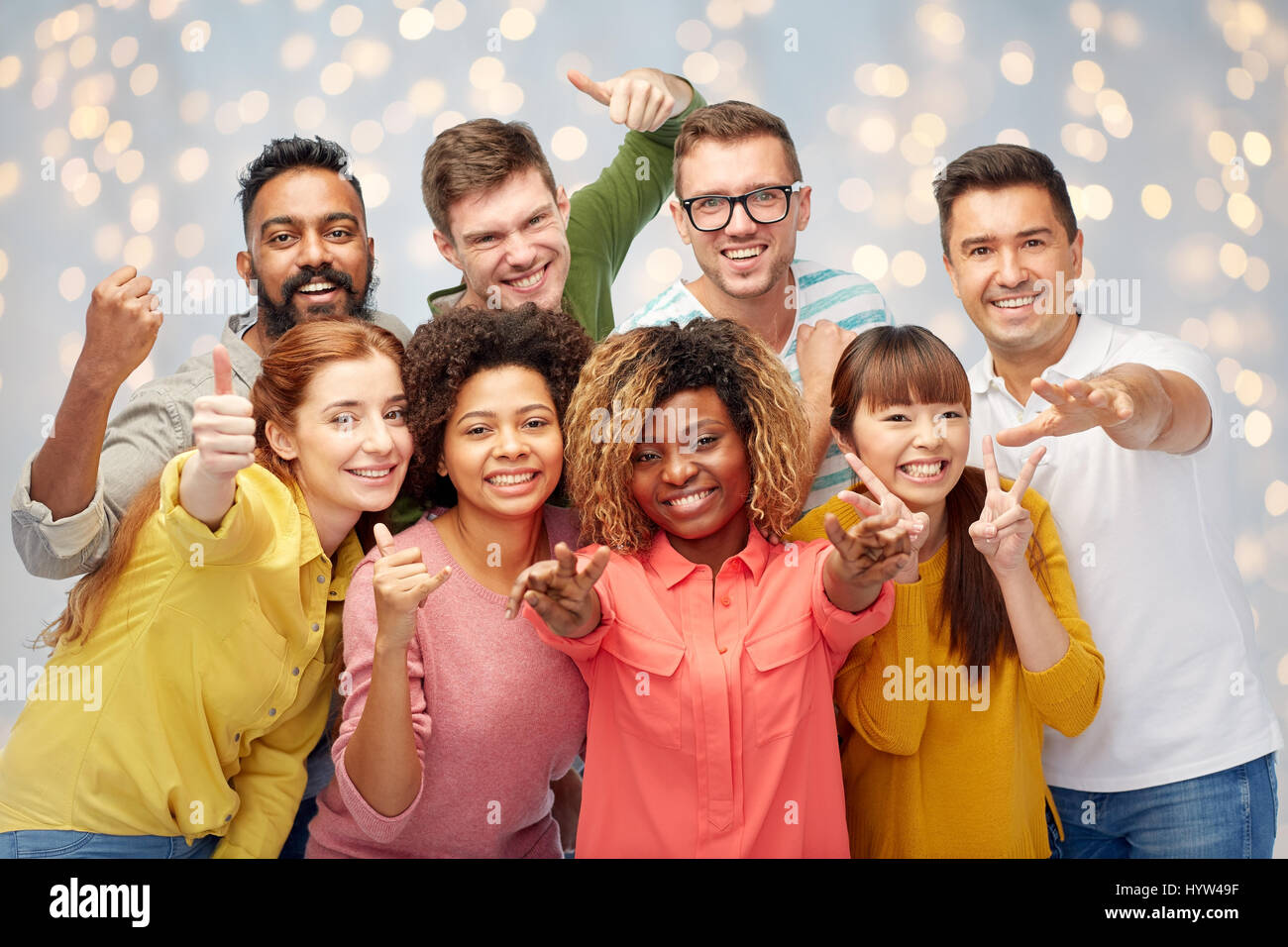 international group of people showing thumbs up Stock Photo - Alamy