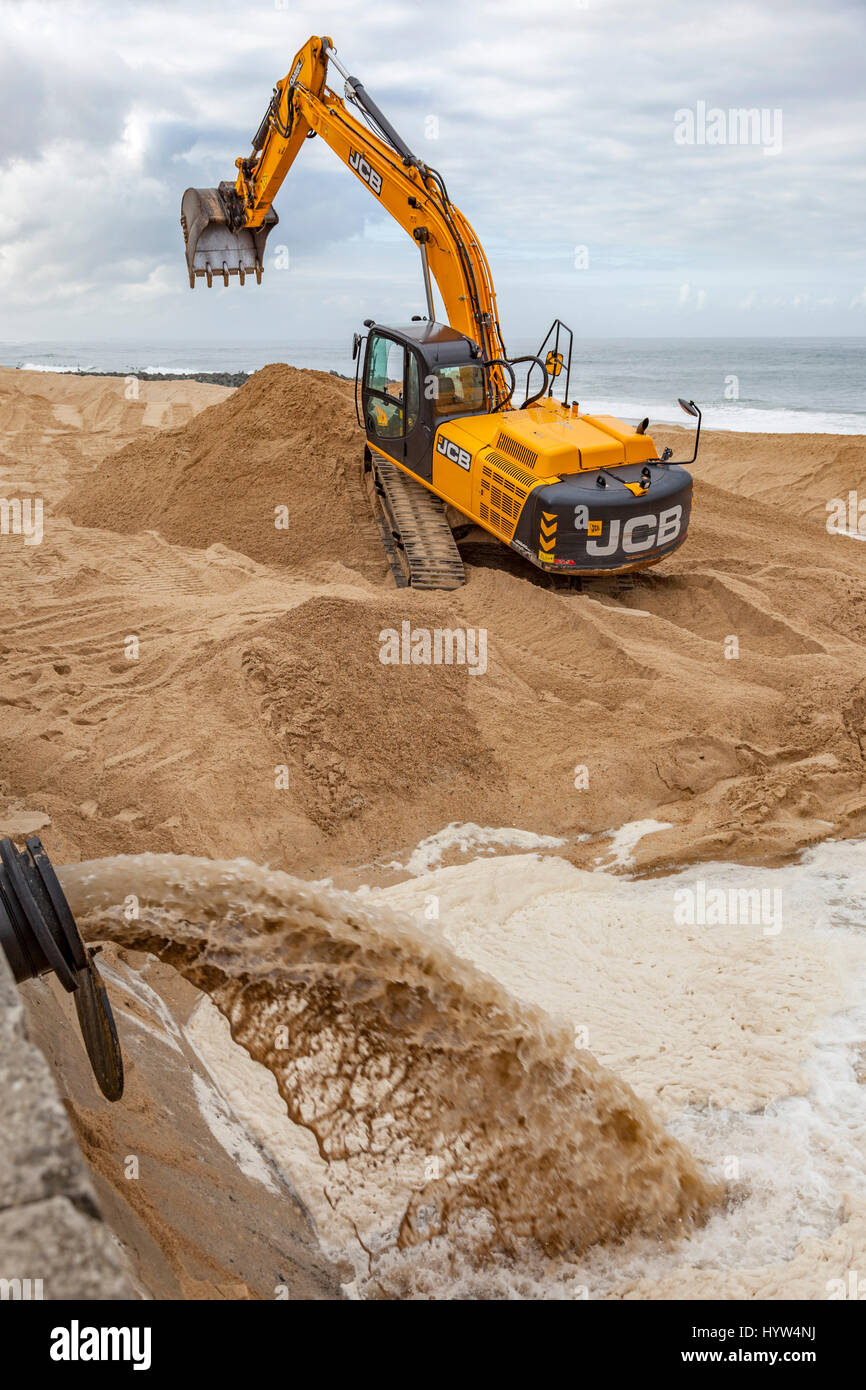 Hydraulic transfer system of sand, at Capbreton (Landes - France). With ...