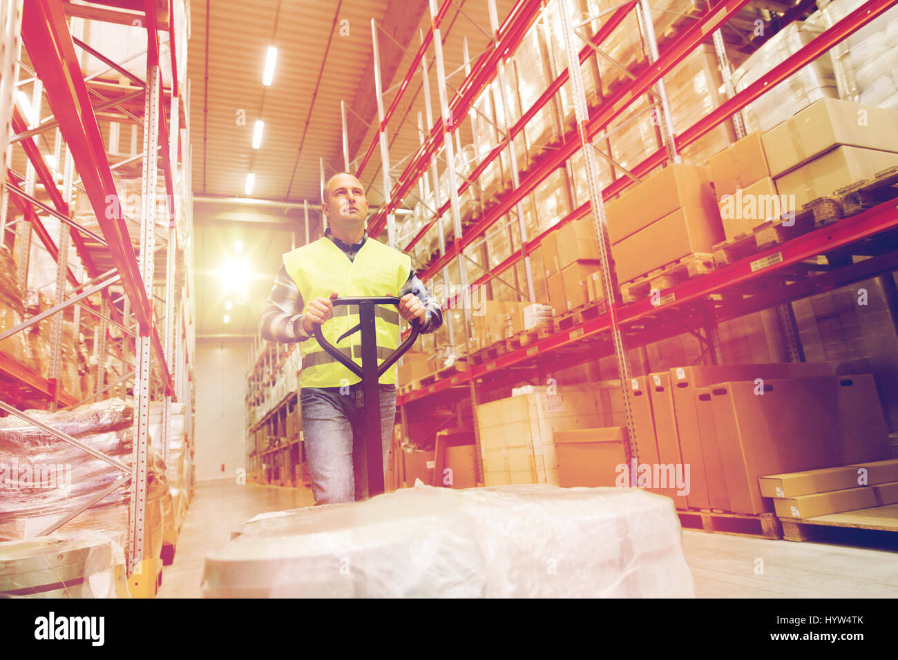 Man carrying loader goods hi-res stock photography and images - Alamy