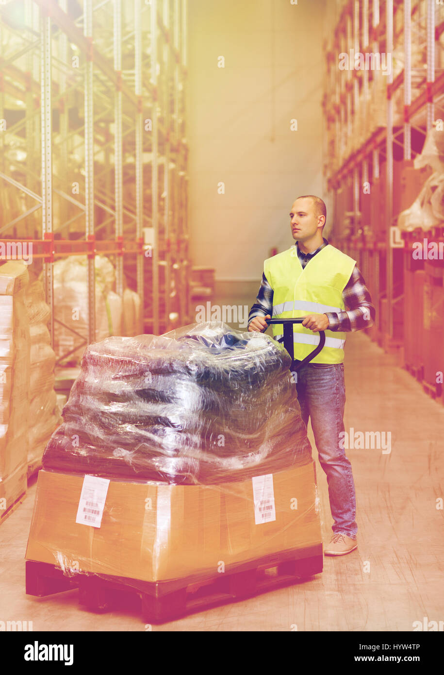 Man carrying loader goods hi-res stock photography and images - Alamy