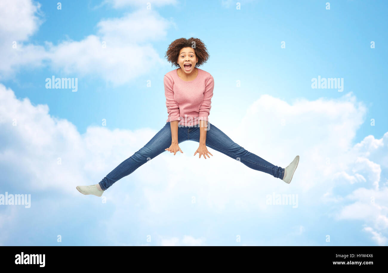 Happy african american woman jumping hi-res stock photography and ...