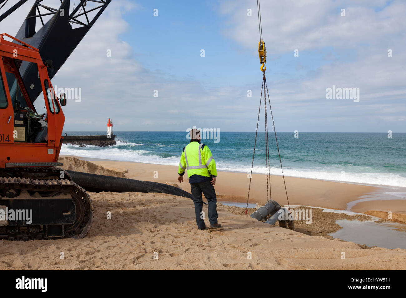 Hydraulic transfer system of sand, at Capbreton (Landes - France). With ...