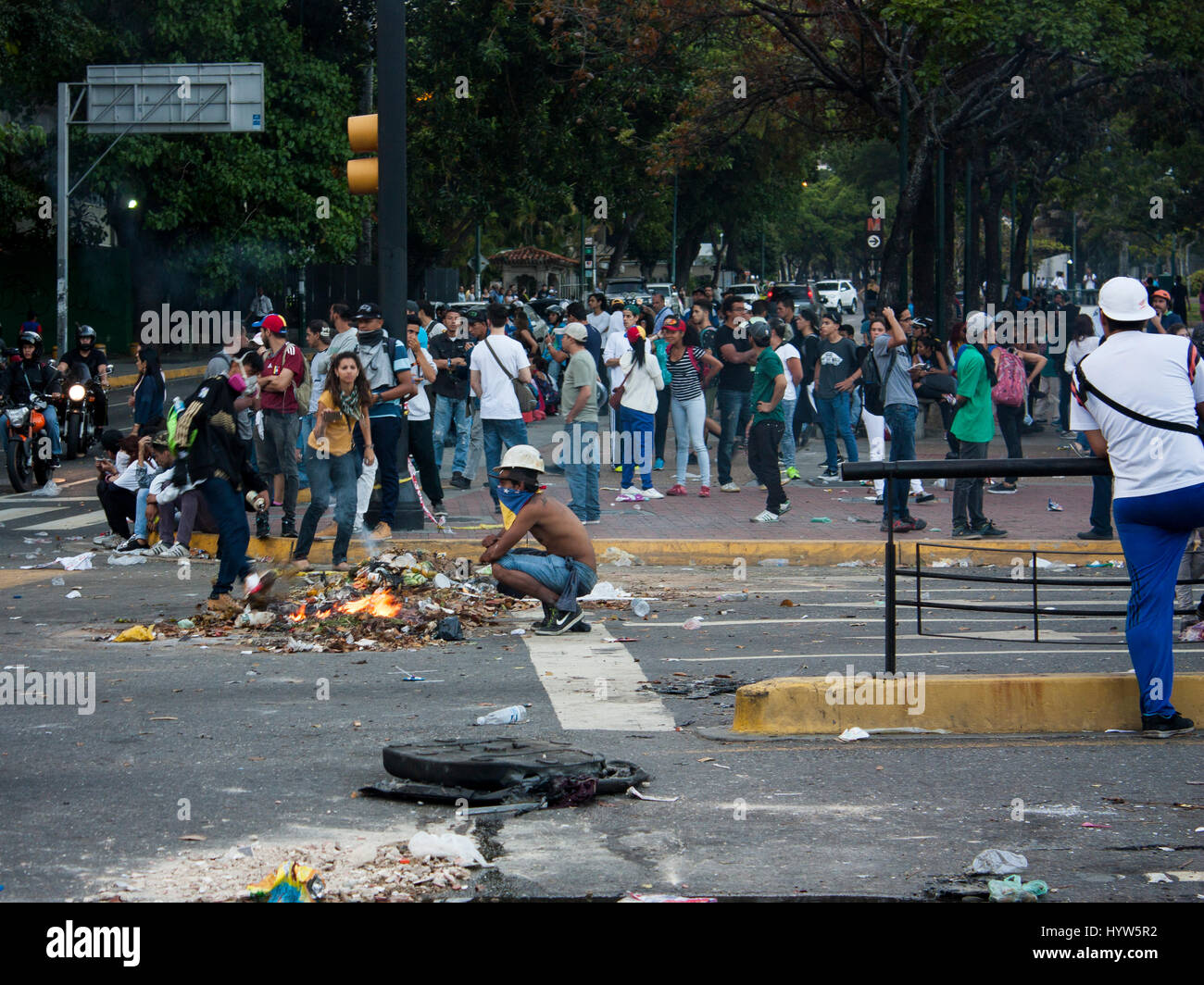 A group of protesters in Caracas (Venezuela) blocking streets against ...