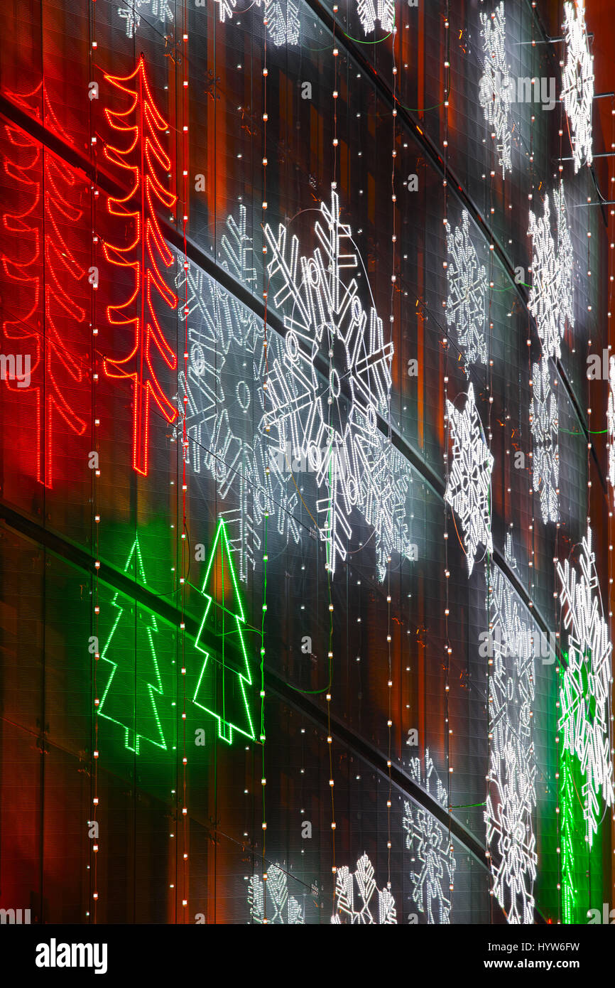 Christmas lights decoration on a building facade. Vertical Stock Photo ...