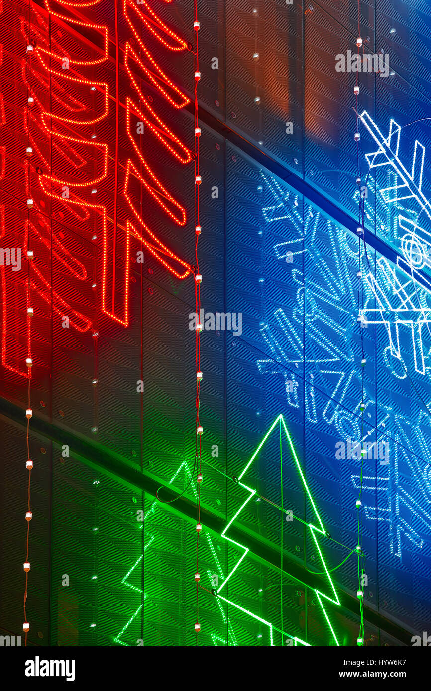 Christmas lights decoration on a building facade. Vertical Stock Photo ...