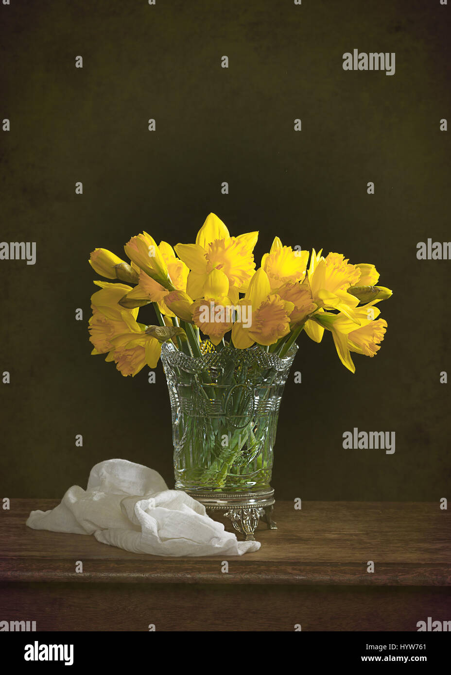 Still life with spring daffodil flowers on rustic table Stock Photo - Alamy