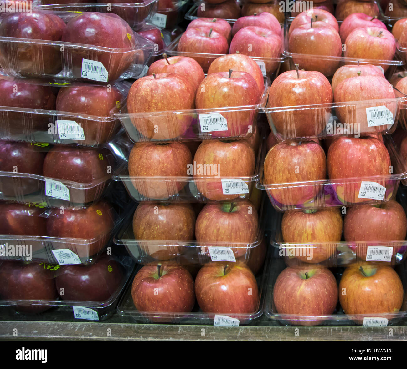 Osaka, JAPAN - APRIL 18, 2016 : Apples on the plastic box with Japanese ...