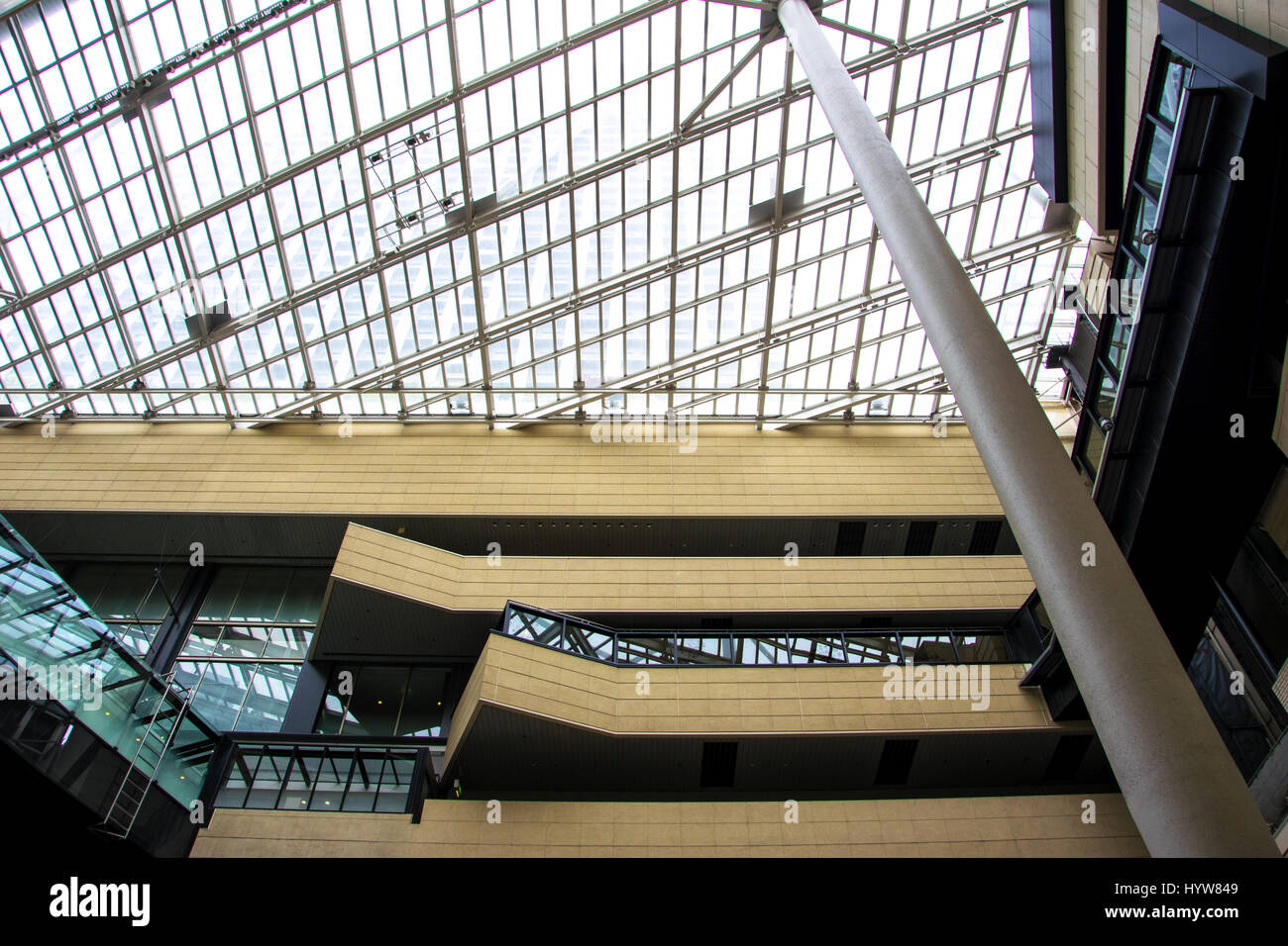 Japan, Osaka - Looking up at the modern view of a tall building. Modern ...