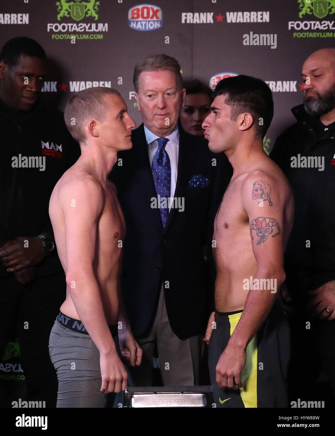 Paul Butler (left), promoter Frank Warren (centre) and Carlos Ruben ...
