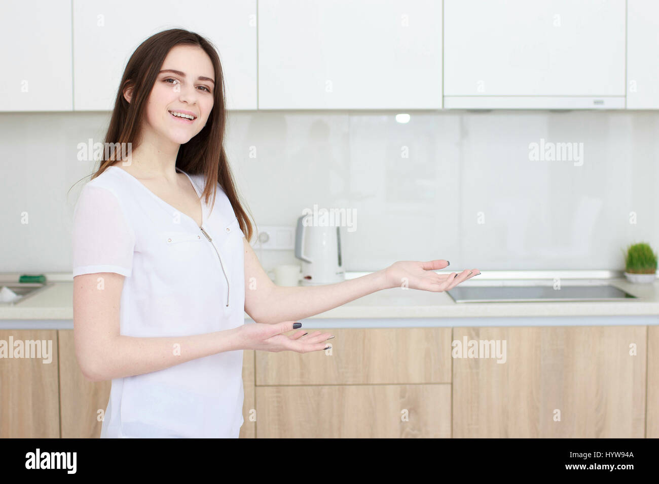 Woman showing displaying copy space for your product message Stock ...