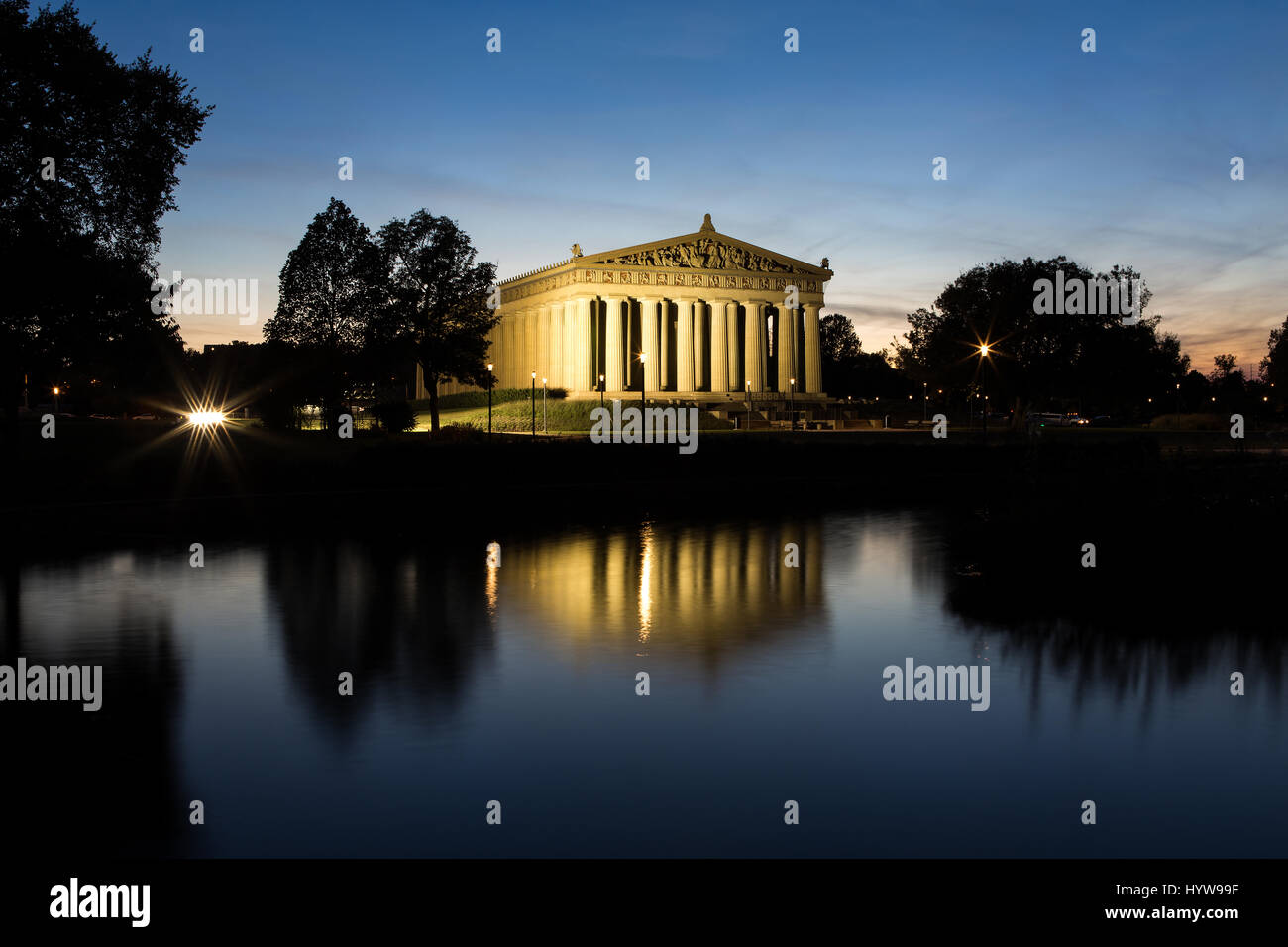 A life sized replica of the famous Parthenon, reflects off a pond in ...