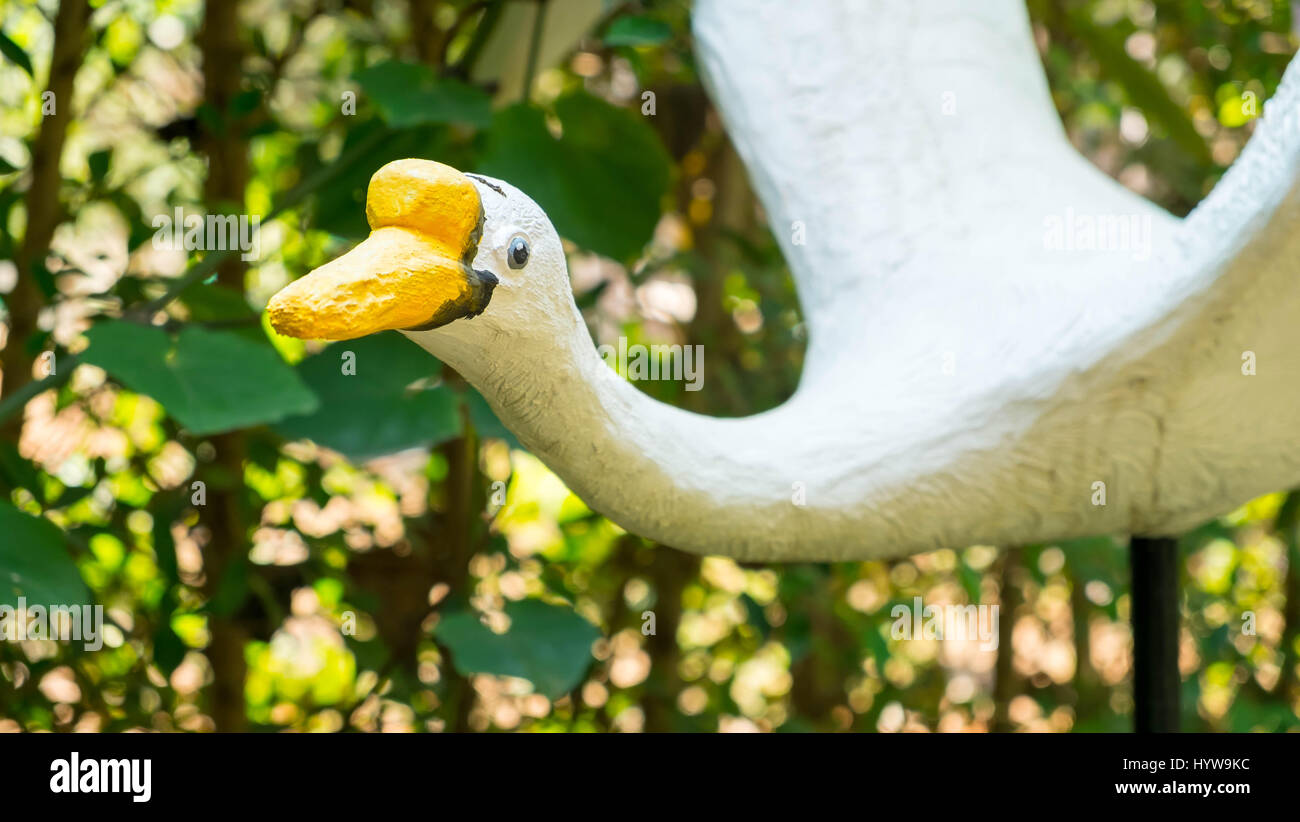The big bird doll is in the garden., Big bird sculpture Stock Photo - Alamy