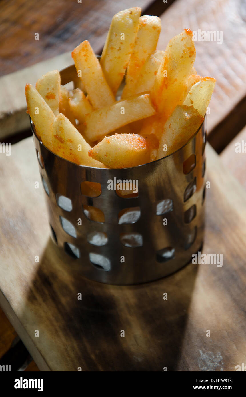 French fries with chili sauce Stock Photo - Alamy
