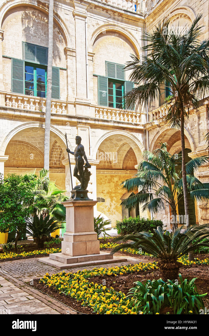 Valletta, Malta - April 1, 2014: Neptune statue in courtyard of ...