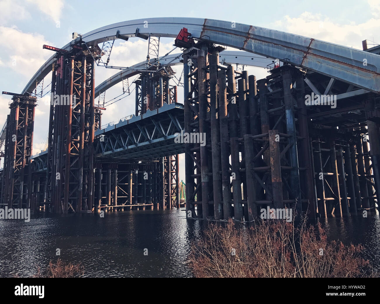 Abandoned old bridge, big engineering construction with metal concrete ...