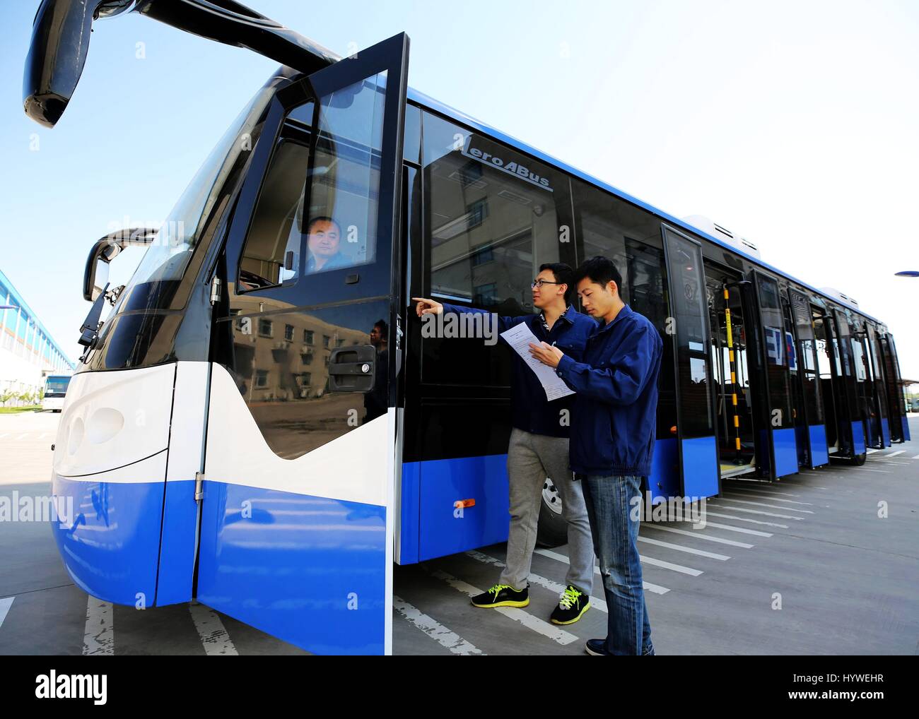 (170426) -- LANGFANG, April 26, 2017 (Xinhua) -- Staff members take ...