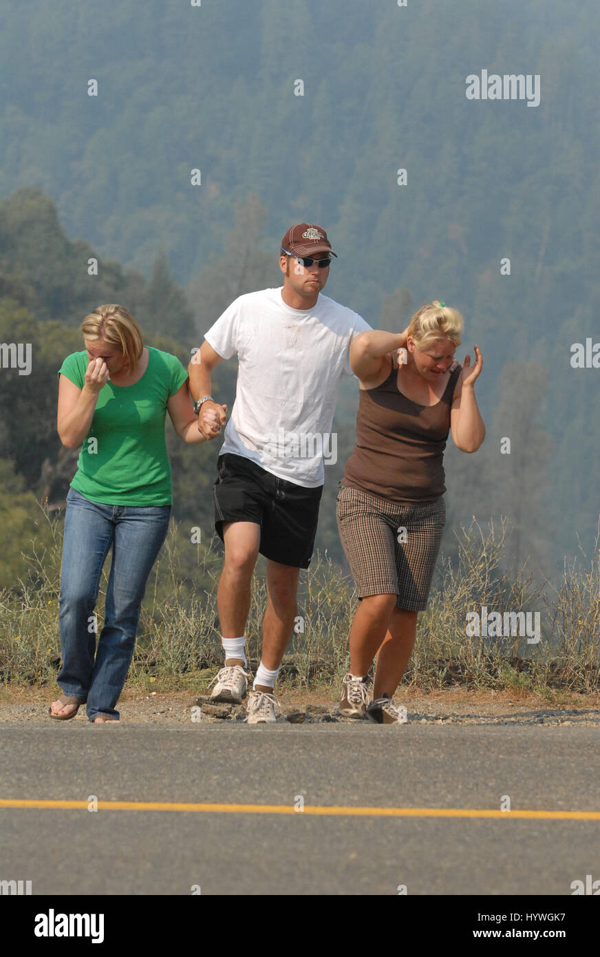 June 25, 2008 - Ron Presba's daughters react to the scene of his burned ...