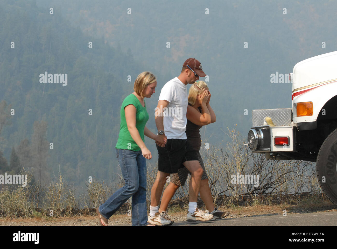 June 25, 2008 - Ron Presba's daughters react to the scene of his burned ...