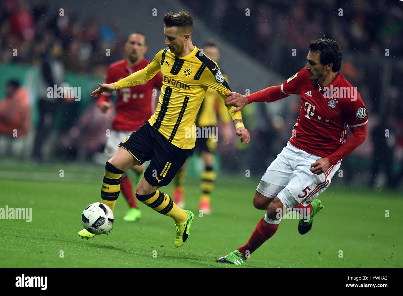 Munich, Germany. 26th Apr, 2017. Munich's Mats Hummels (R) and Dortmund ...