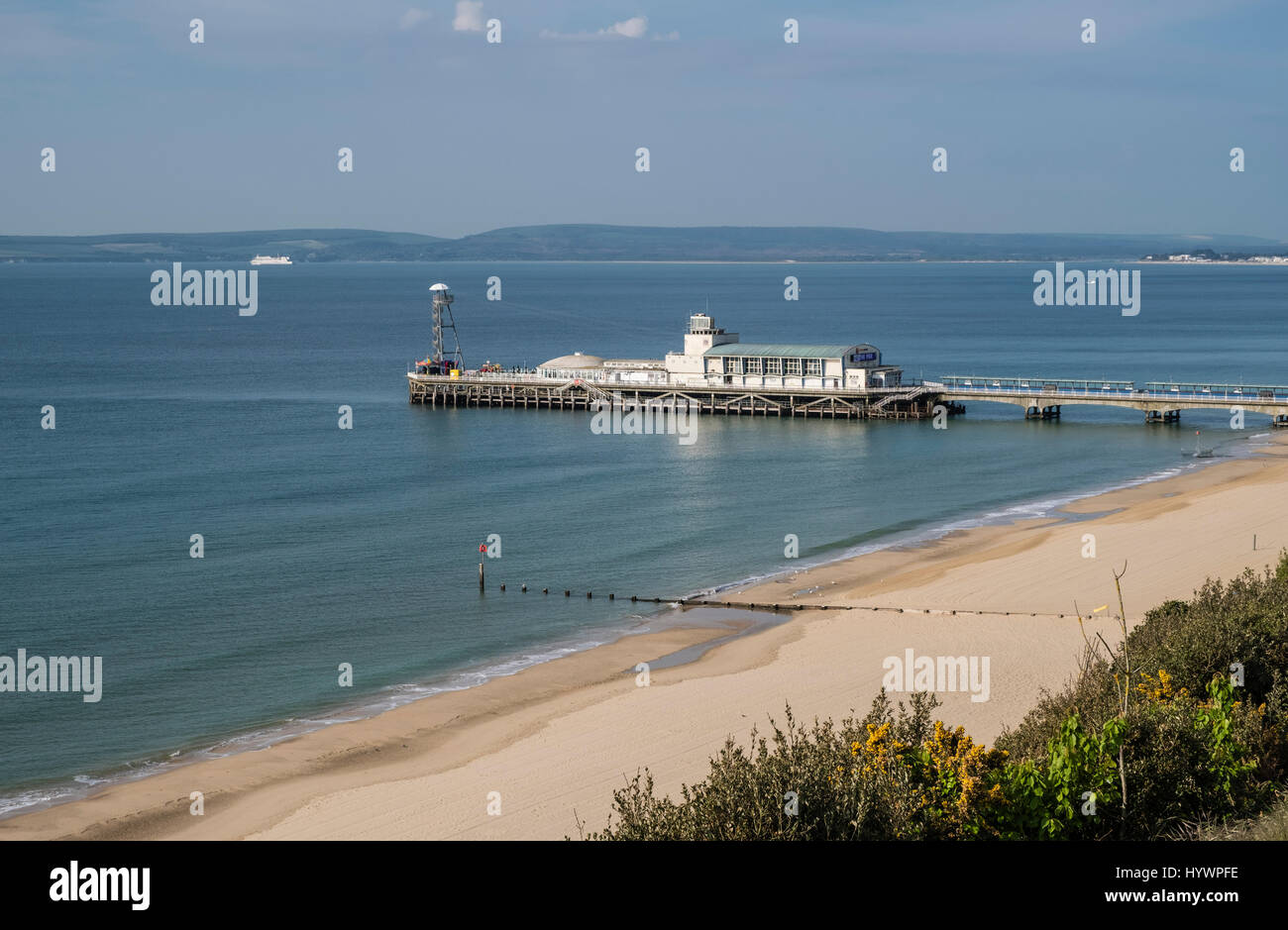 Bournemouth Pier and Beach, Poole Bay, with calm sea, blue sky, white ...
