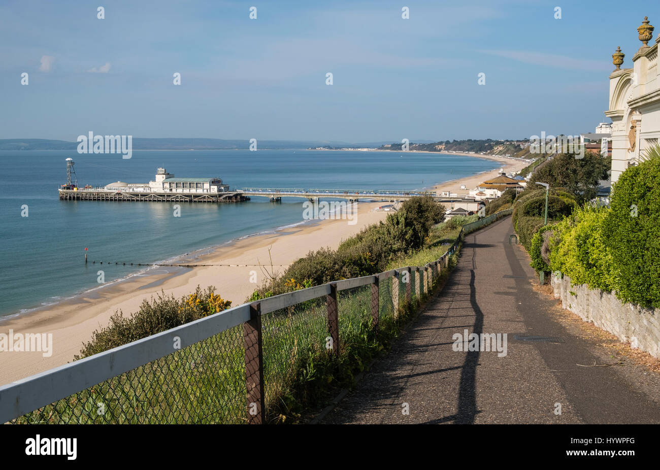 Bournemouth Pier and Beach, Poole Bay, with calm sea, blue sky, white ...