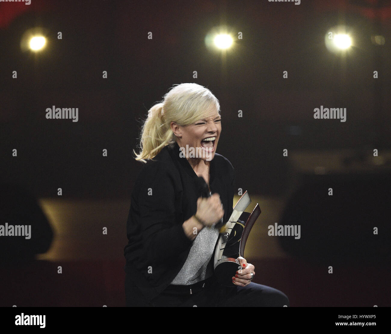 Berlin, Germany. 06th Apr, 2017. The singer Ina Mueller receives an ...