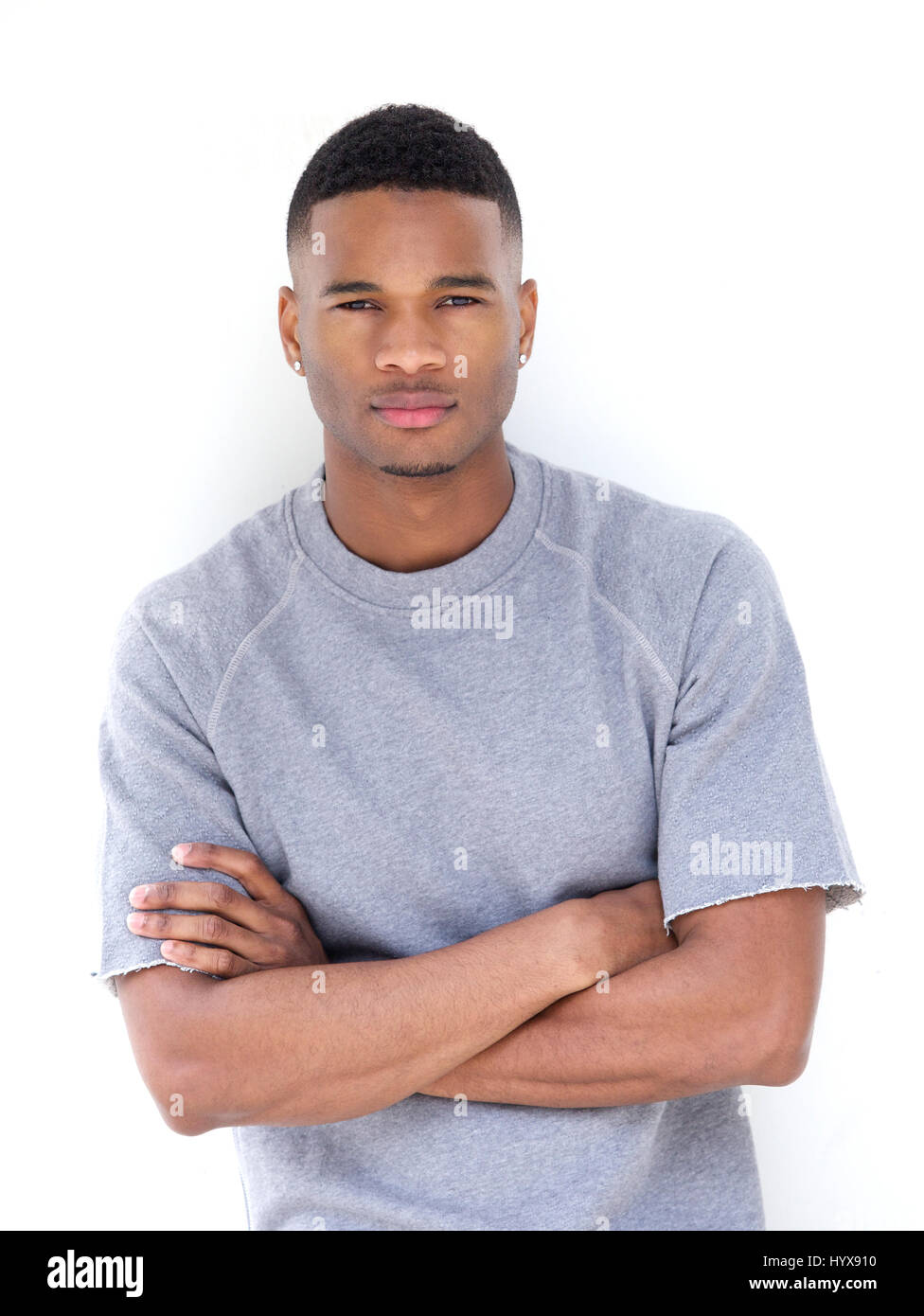 Portrait of a cool african american man posing with arms crossed Stock ...