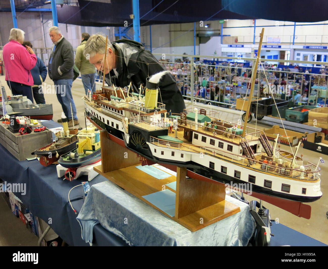 A visitor admiring a scale model of 'Talisman' - a Clyde paddle steamer ...