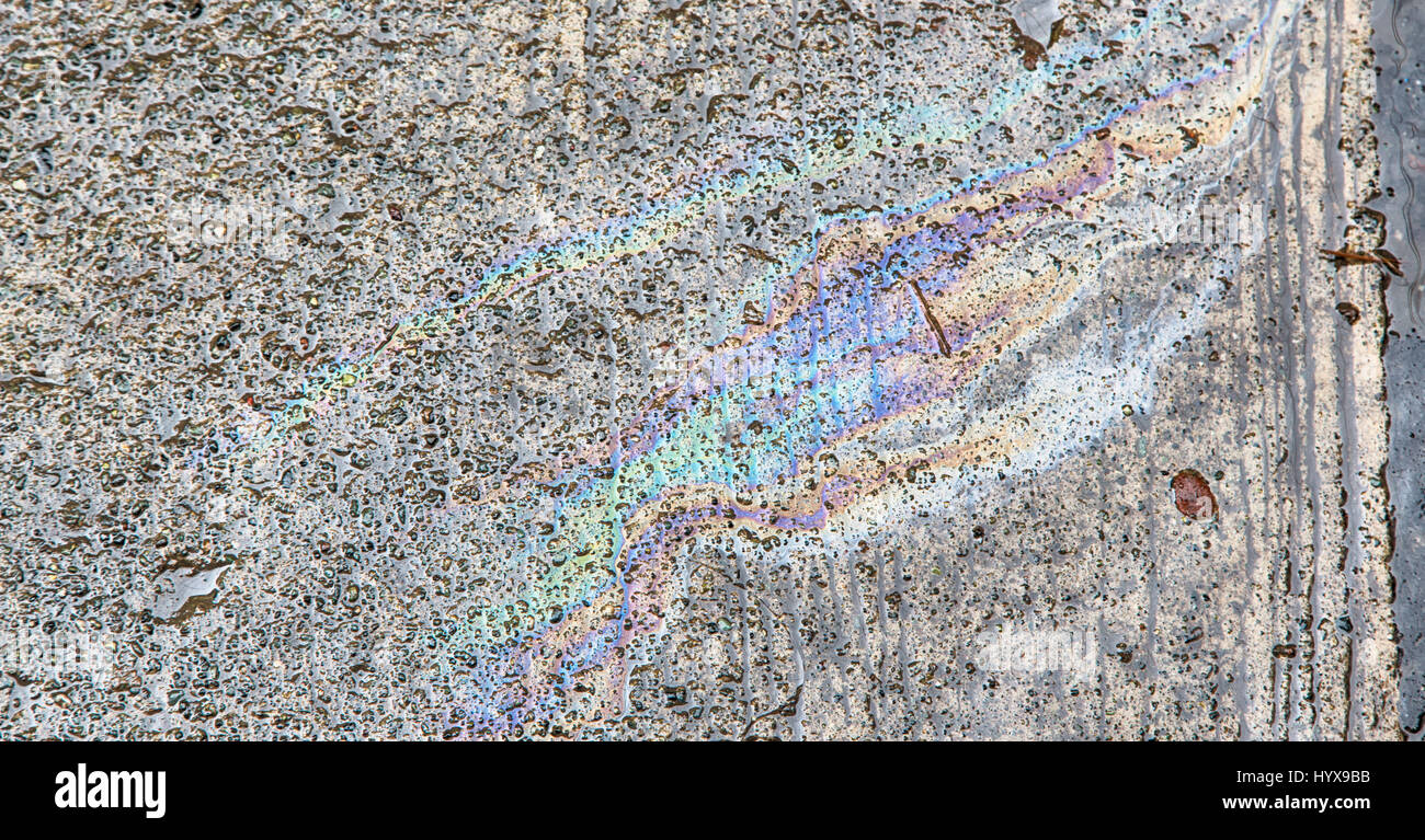 after rain in sidewalk the gasoline make color like rainbow Stock Photo ...