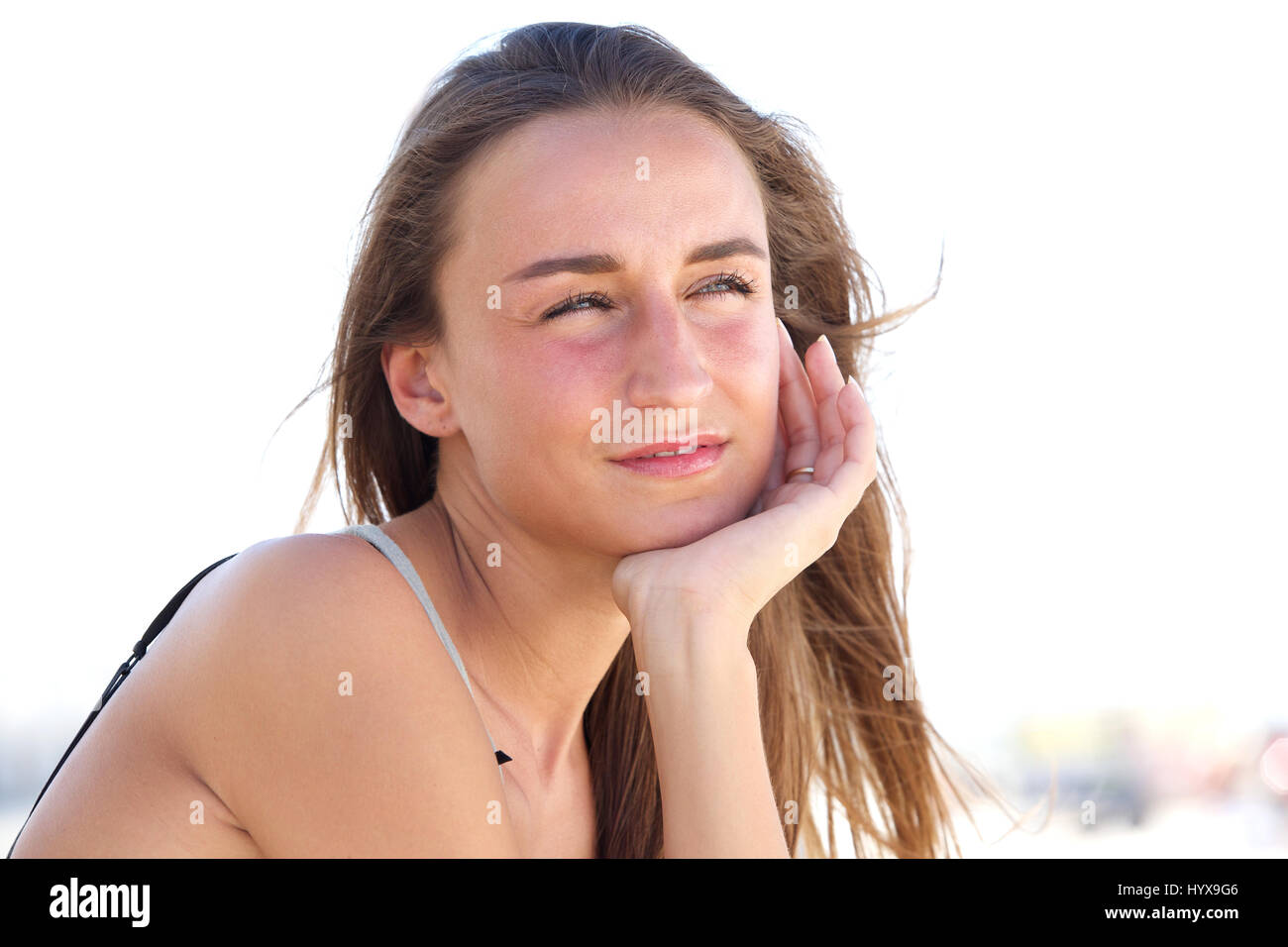 Close up portrait of an attractive young woman thinking outside Stock ...