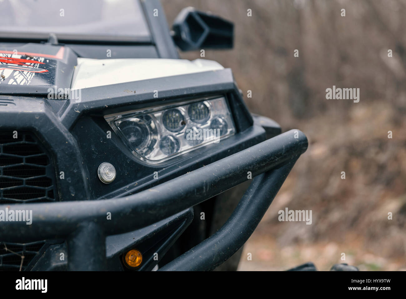 terrain vehicle in the woods, close up Stock Photo - Alamy