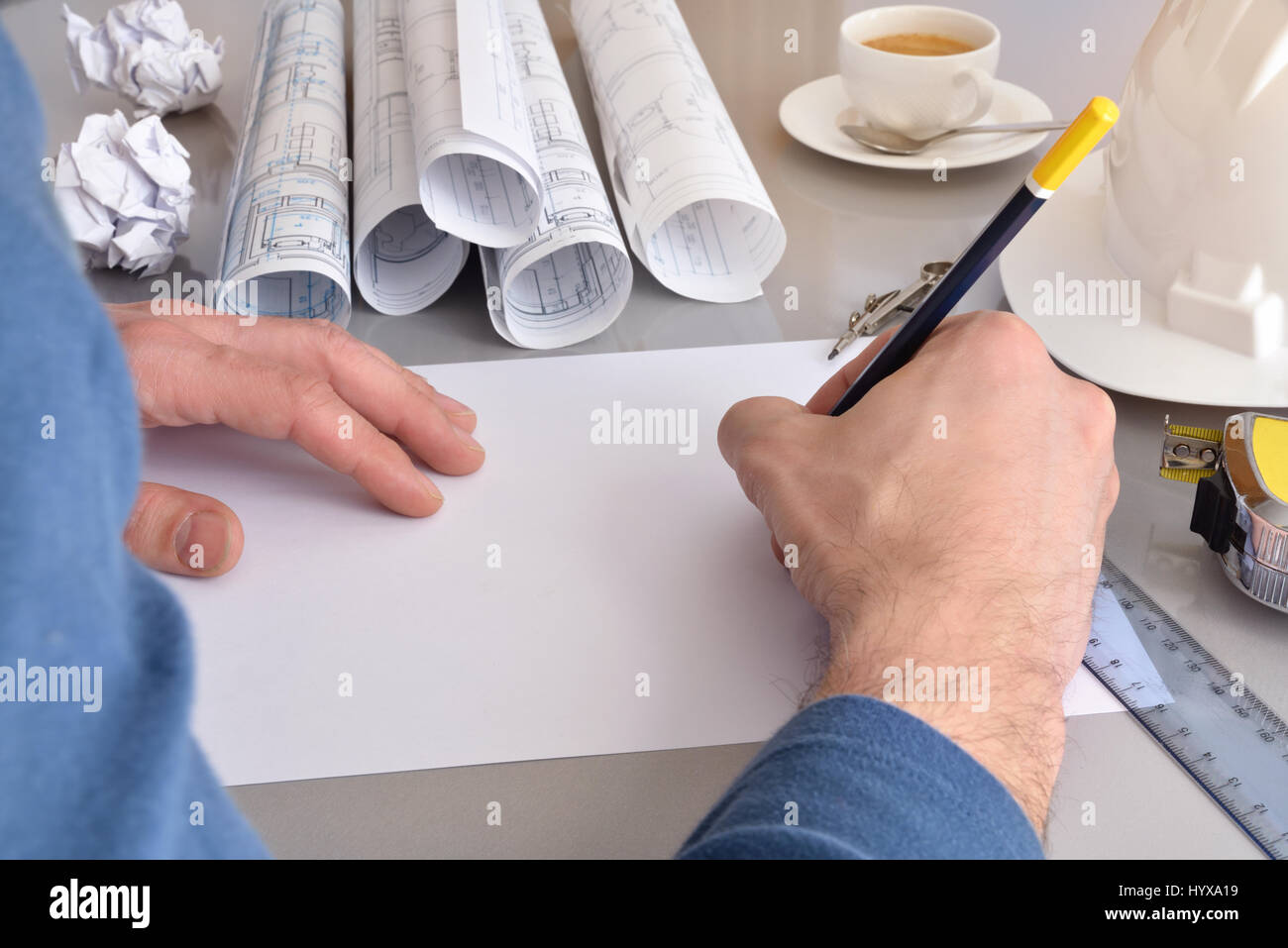Construction engineer starting a new project close up. With working ...