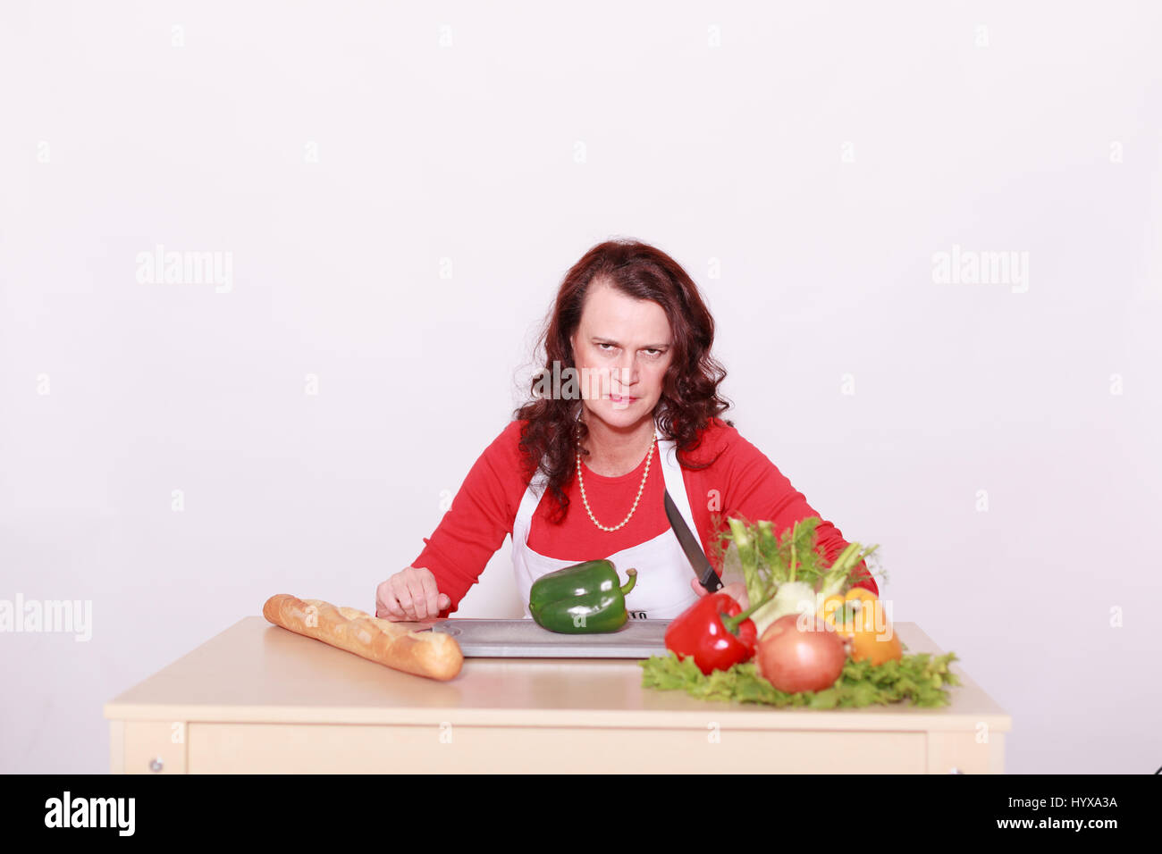 Cut angry Lady with the vegetables Stock Photo - Alamy