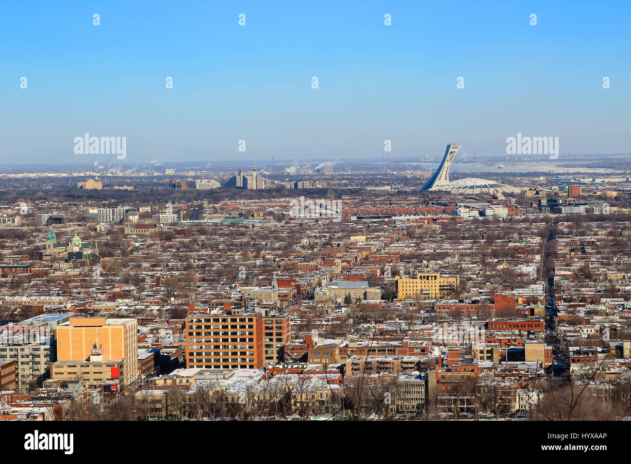 View from top of hill overlooking houses and stadium in the city of ...