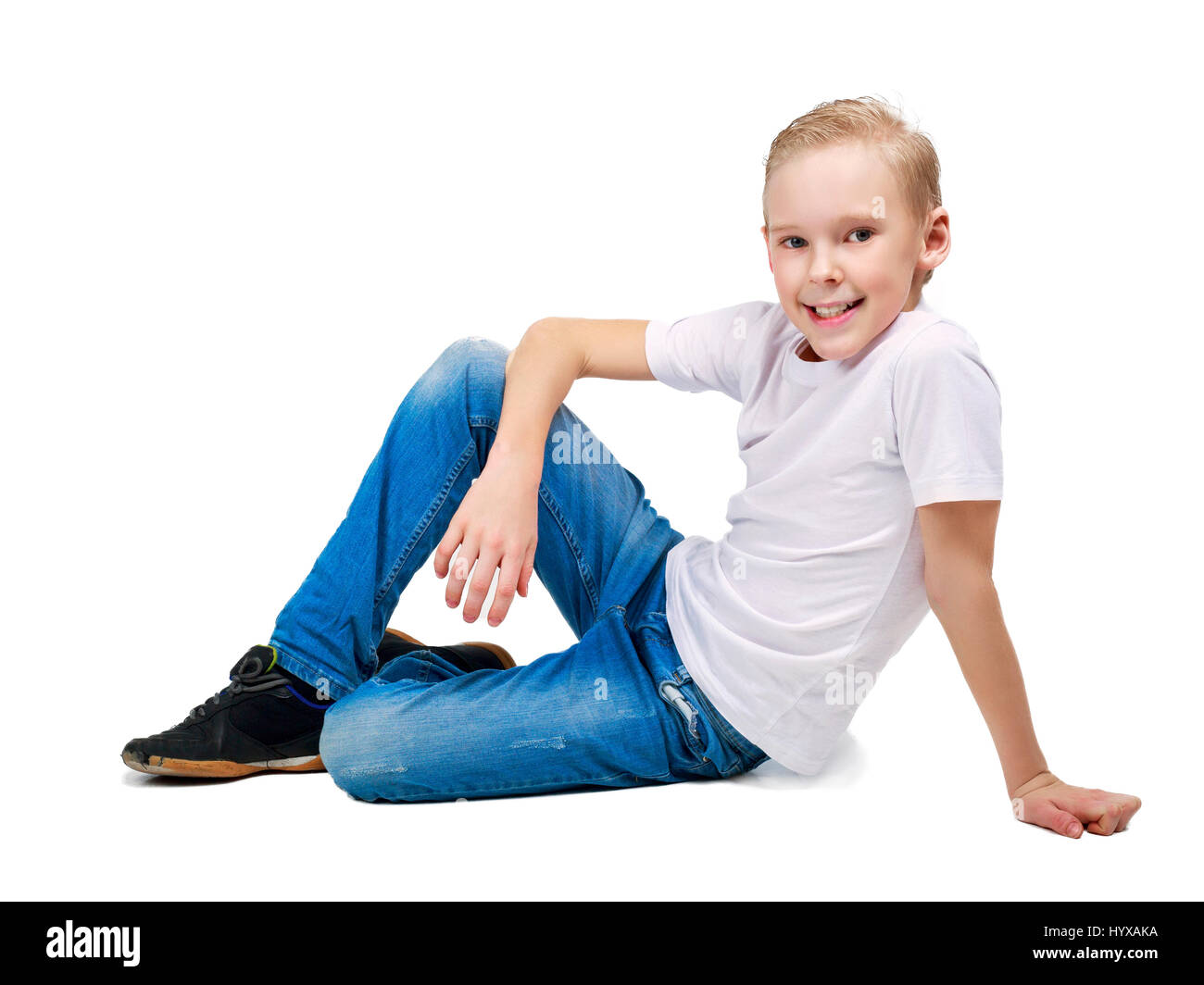 happy smiling nine years old boy, isolated against white background ...